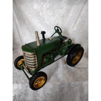 Blikken miniatuur groene tractor met gele wielen